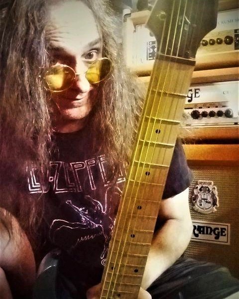 CHRISTMAS IN JULY – OFFICIAL WEBSITE FOR 7-STRING GUITARIST STEVE BELLO